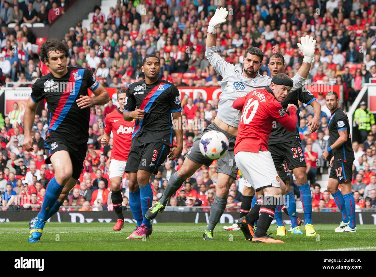 Wayne Rooney of Manchester United struggles to reach a headed chance ...
