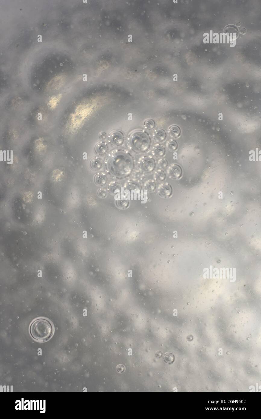 glycerin and water abstract background with selective focus grey color ...