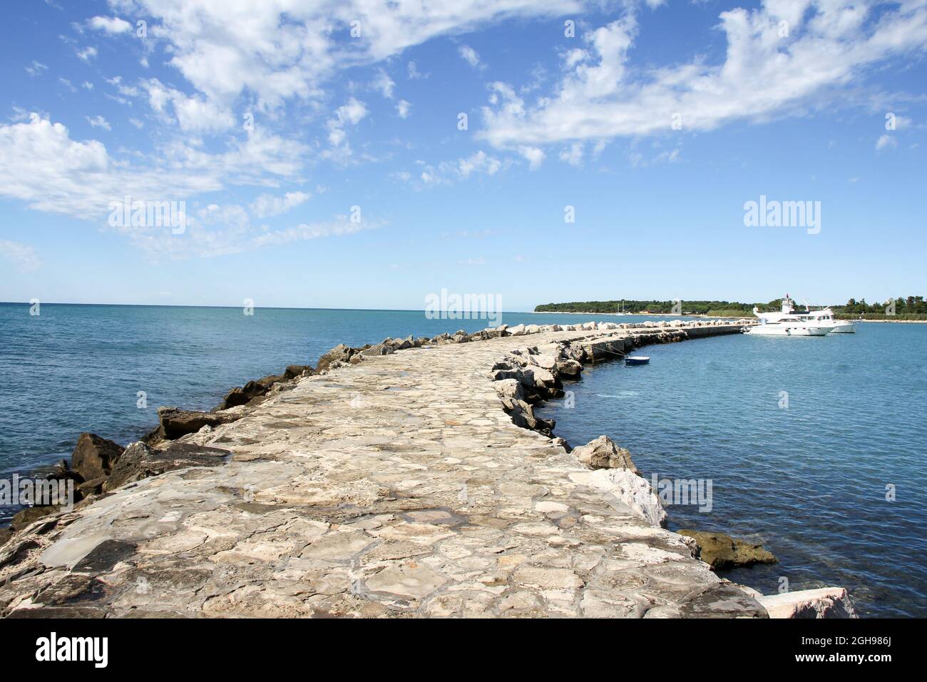 Curved walkway out into the Mediterranean Sea Stock Photo - Alamy