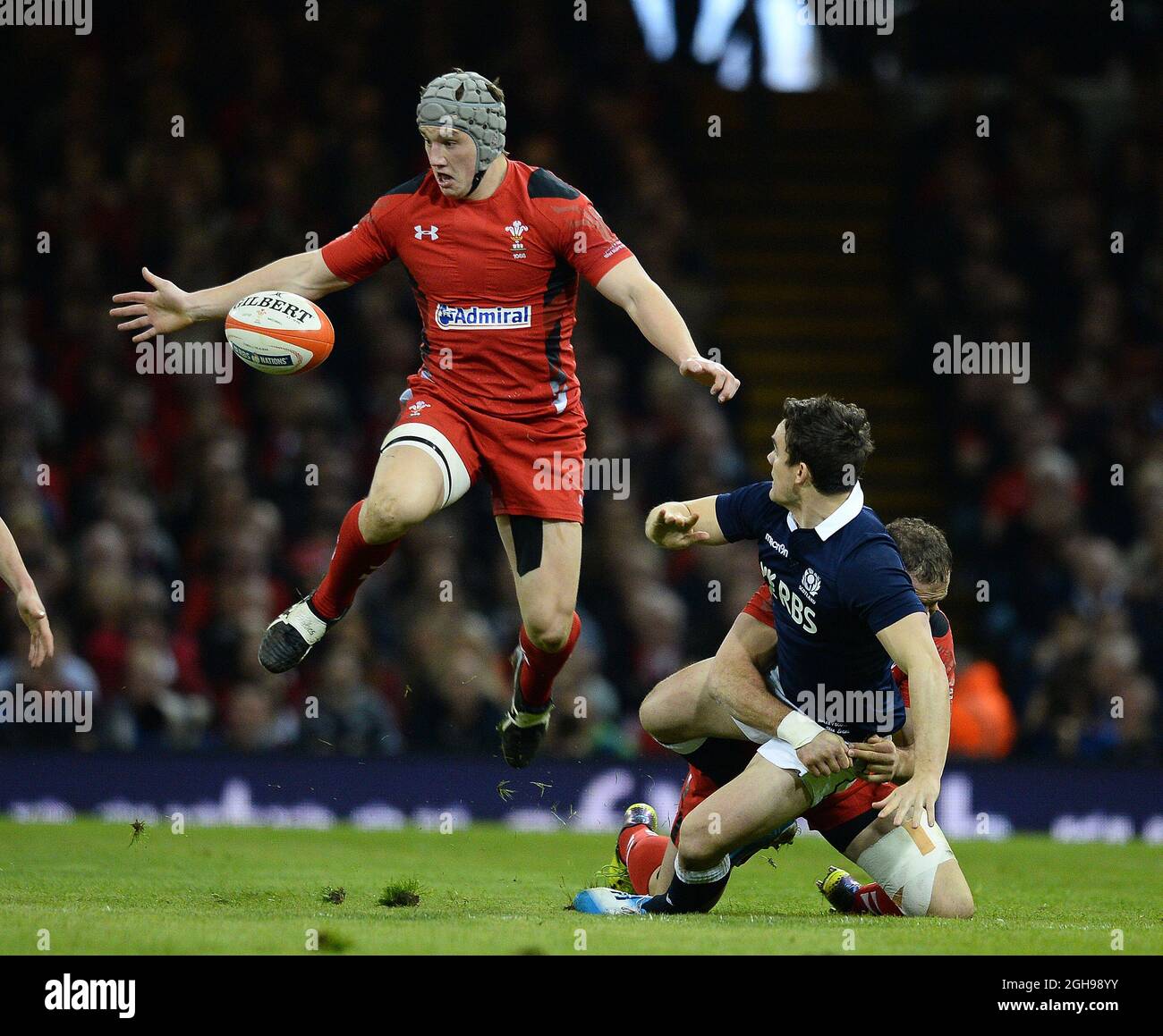 Jonathan Davies of Wales intercepts a pass by Max Evans of Scotland ...