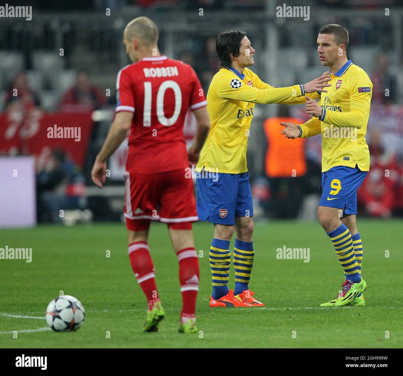 Arsenal's Lukas Podolski celebrates scoring his sides opening goal ...