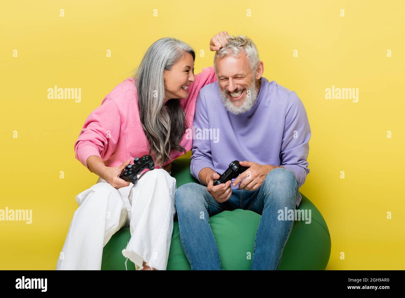 Aged woman knocking head husband hi-res stock photography and images ...