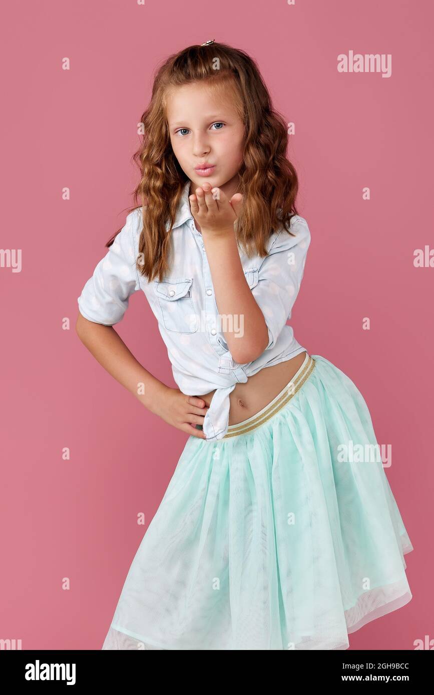 cute little caucasian redhead child girl blowing air kiss Stock Photo ...