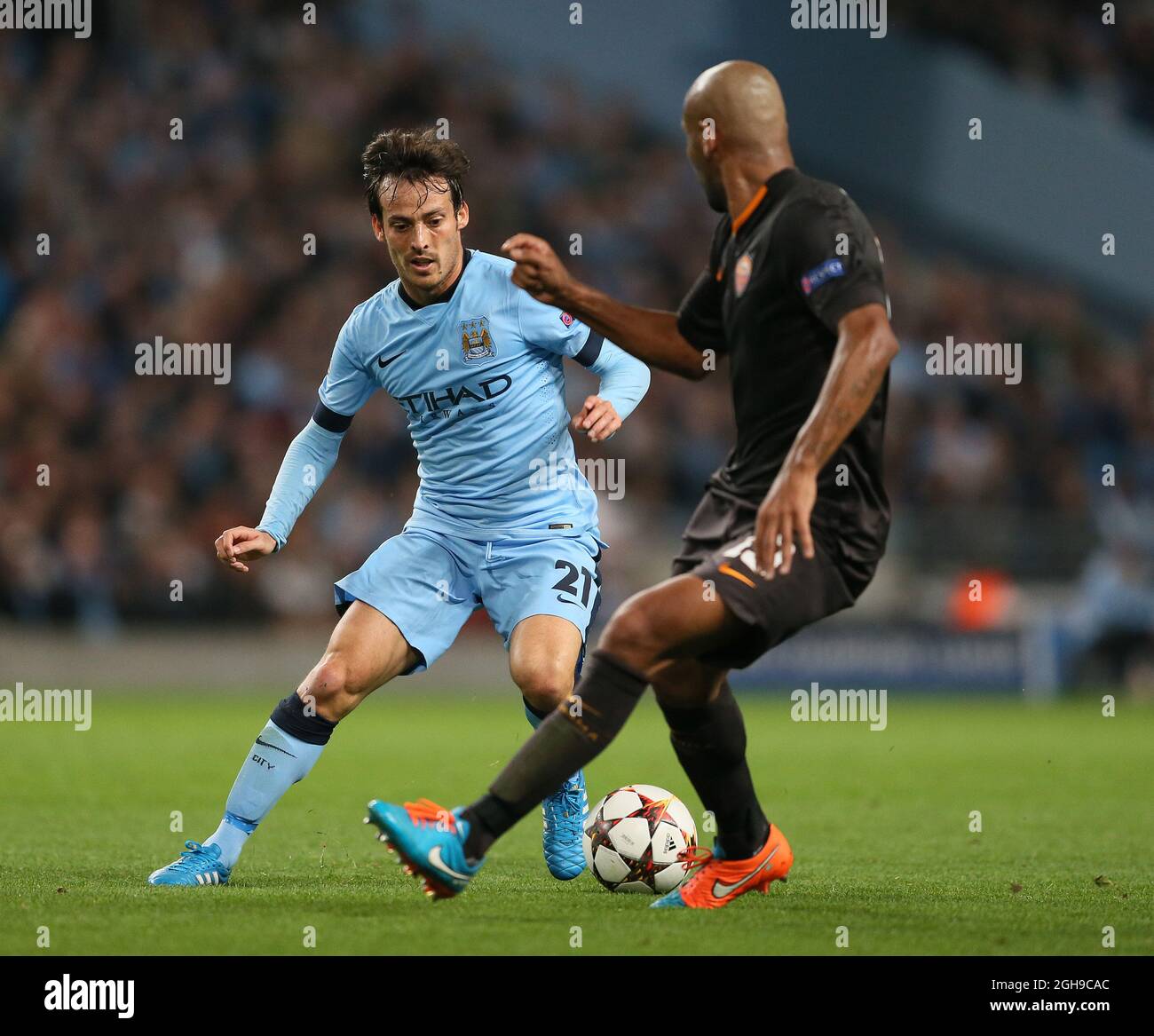 David Silva of Manchester City turns Maicon of Roma during UEFA ...