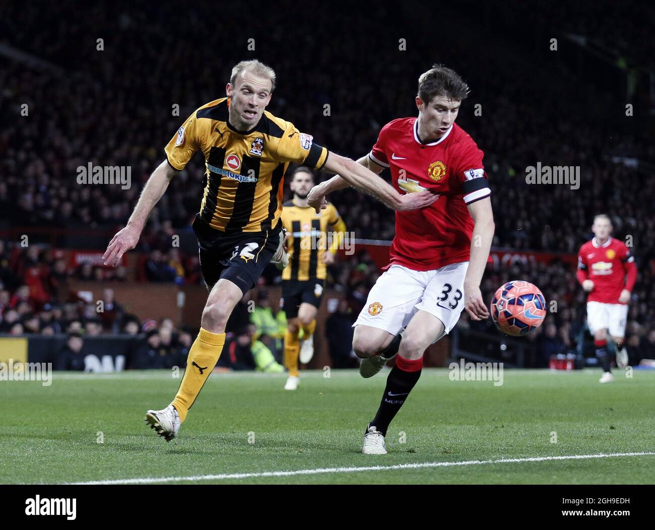 Luke Chadwick of Cambridge Utd challenges Paddy McNair of Manchester ...