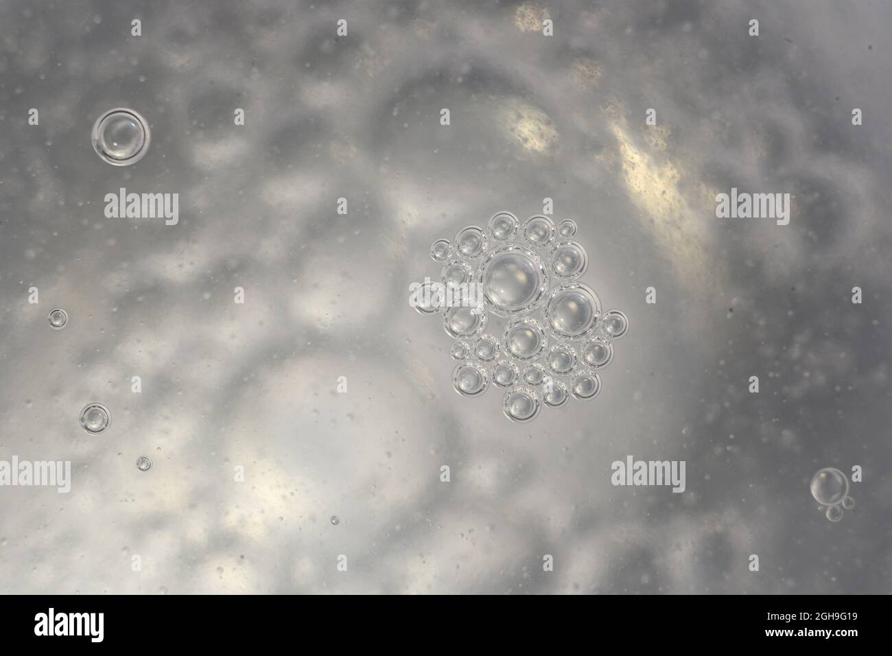 glycerin and water abstract background with selective focus grey color ...