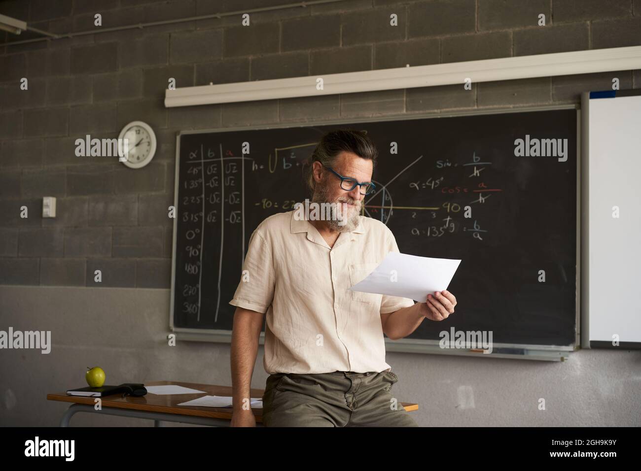 High school teacher in class Stock Photo - Alamy