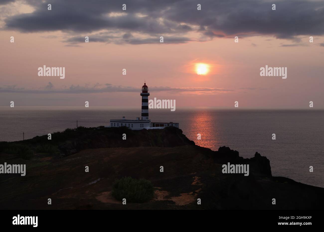 Sunset at the lighthouse of Ponta da Barca, Graciosa island, Azores ...