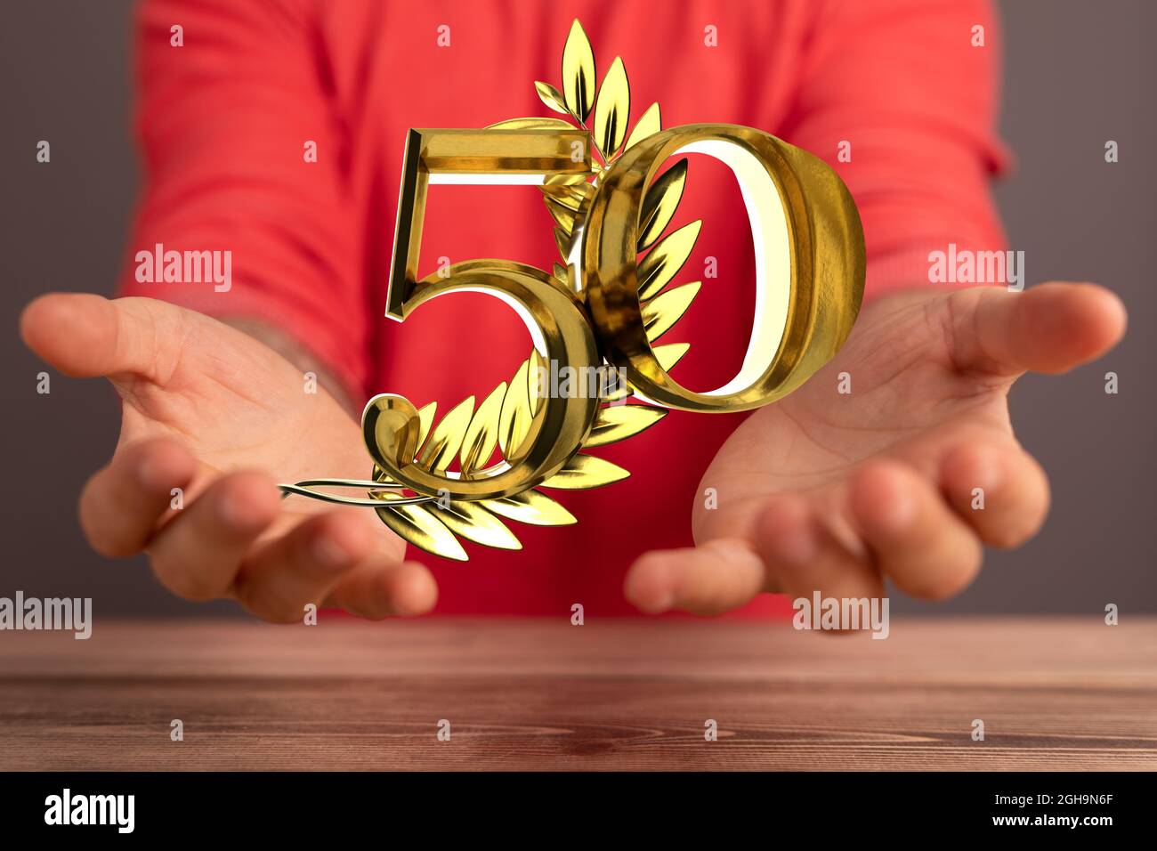 Illustration of years Anniversary symbol in a hand Stock Photo - Alamy