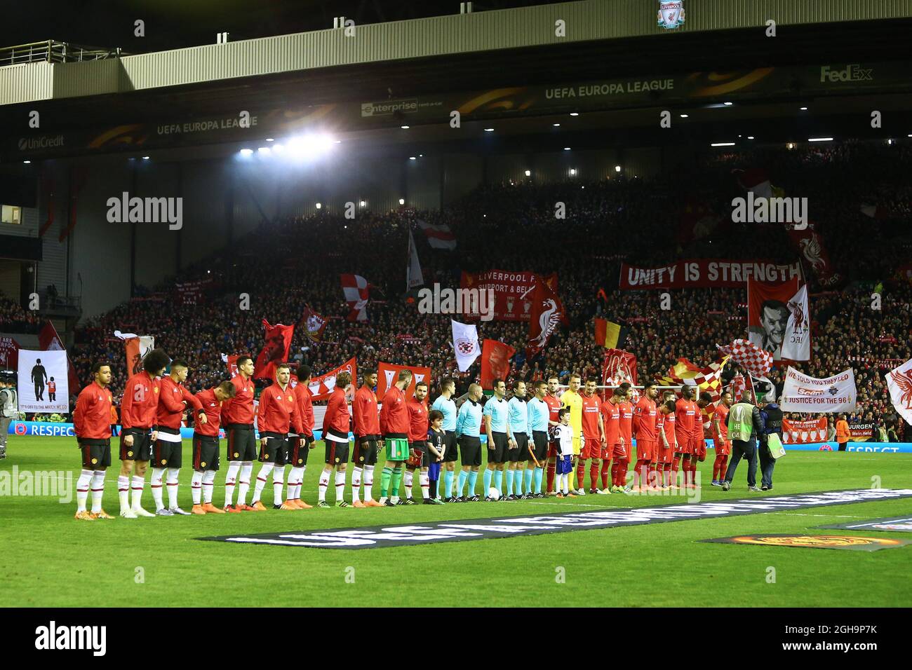 The sides line up during the UEFA Europa League match at Anfield. Photo ...