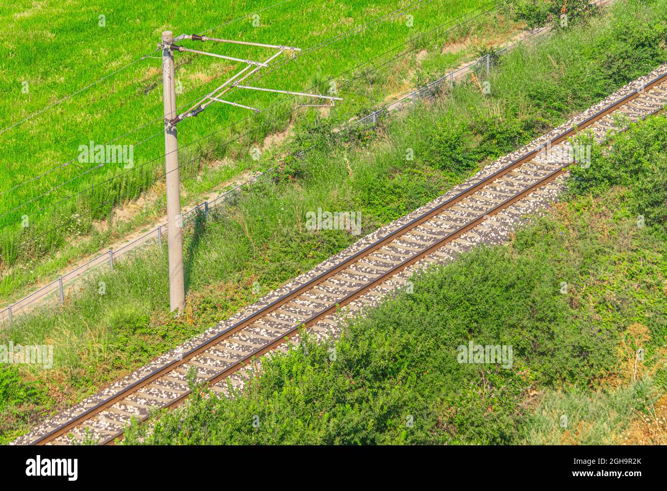 Railway track and electric pole Stock Photo - Alamy