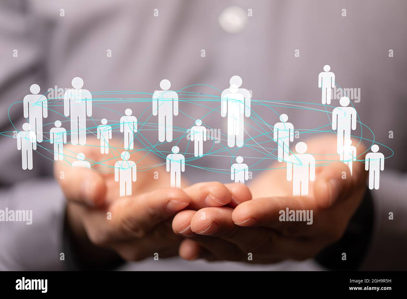 Social networking illustration in a hand of a man as a concept of team ...