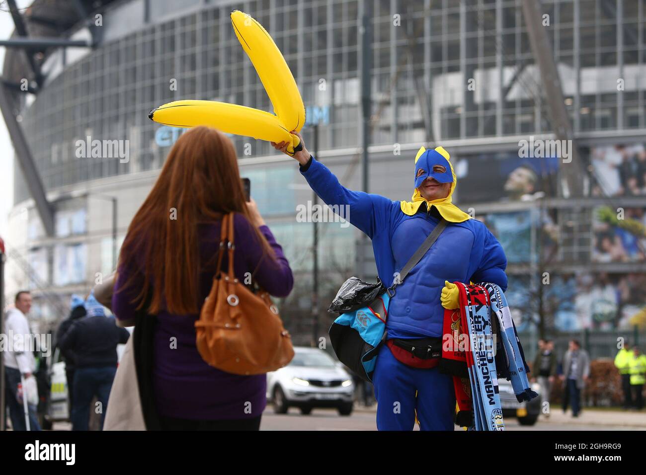 A man dressed as Bananaman sells inflatable bananas during the Barclays ...