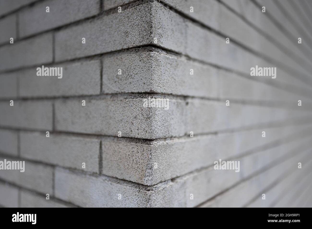 Closeup shot of the corner of a brick-walled building Stock Photo - Alamy