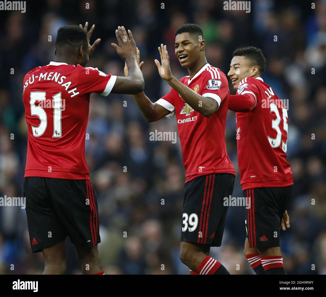 Marcus Rashford of Manchester United celebrates the win with Timothy ...