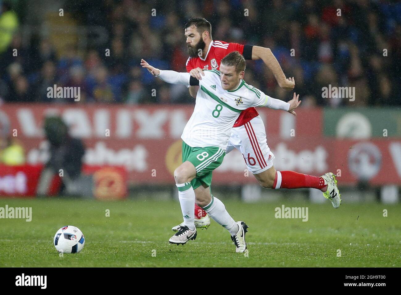 Steven Davis of Northern Ireland battles Joe Ledley of Wales during the ...