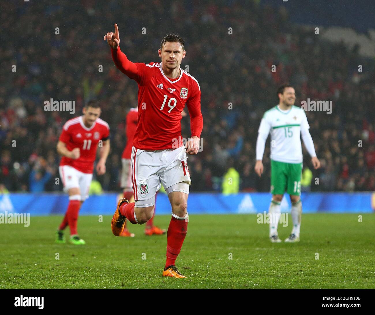 Simon Church of Wales celebrates his goal during the international ...