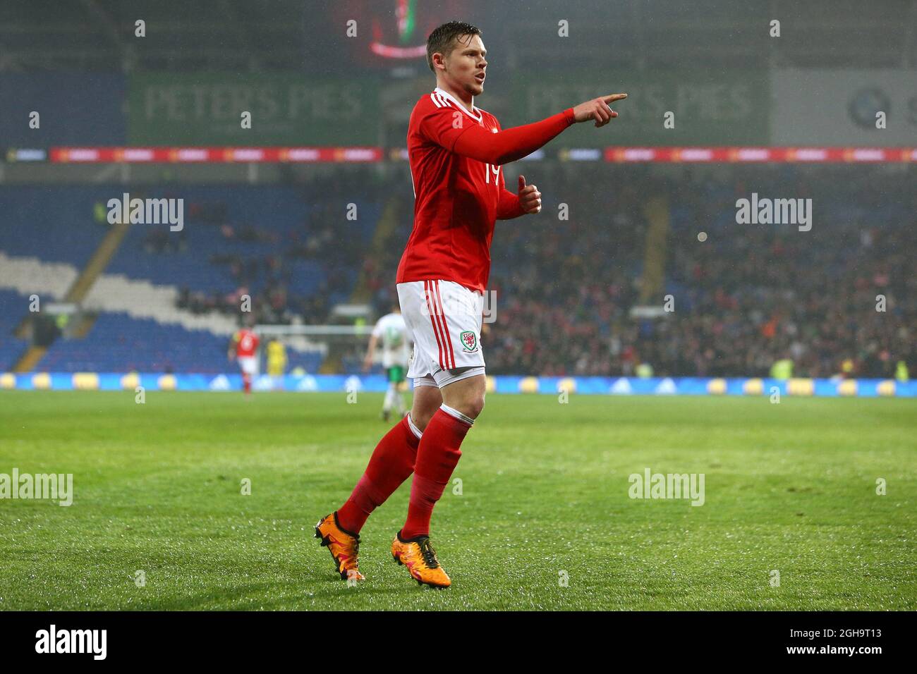 Simon Church of Wales celebrates his goal during the international ...