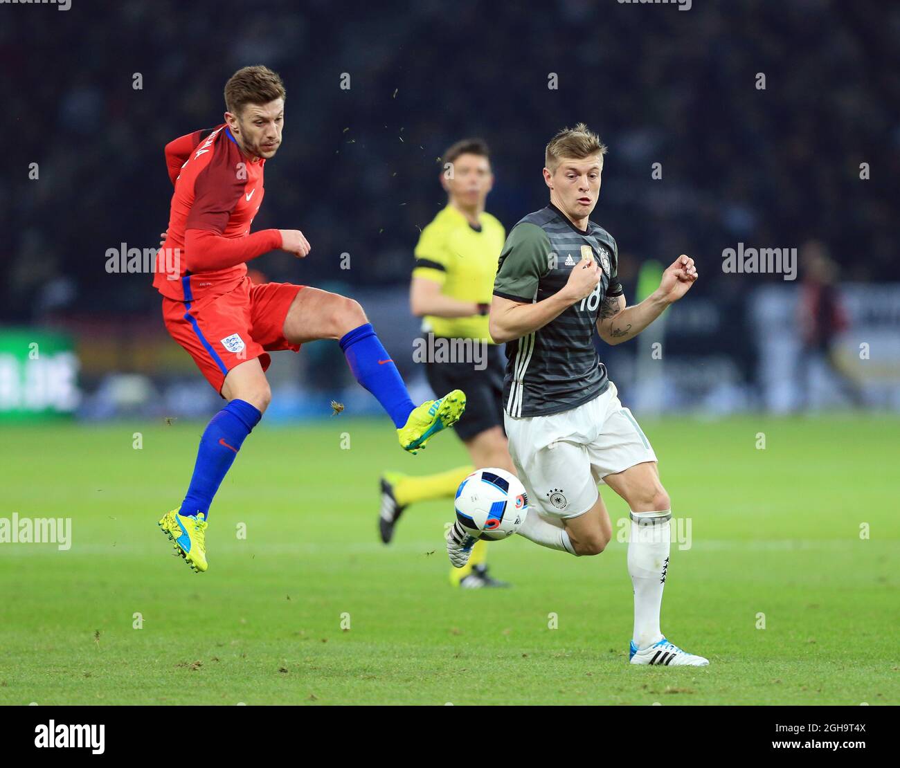 Germany's Toni Kroos tussles with England's Adam Lallana during the ...