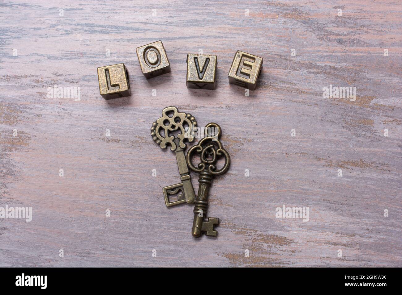 Love letters decoration and keys on a table Stock Photo - Alamy