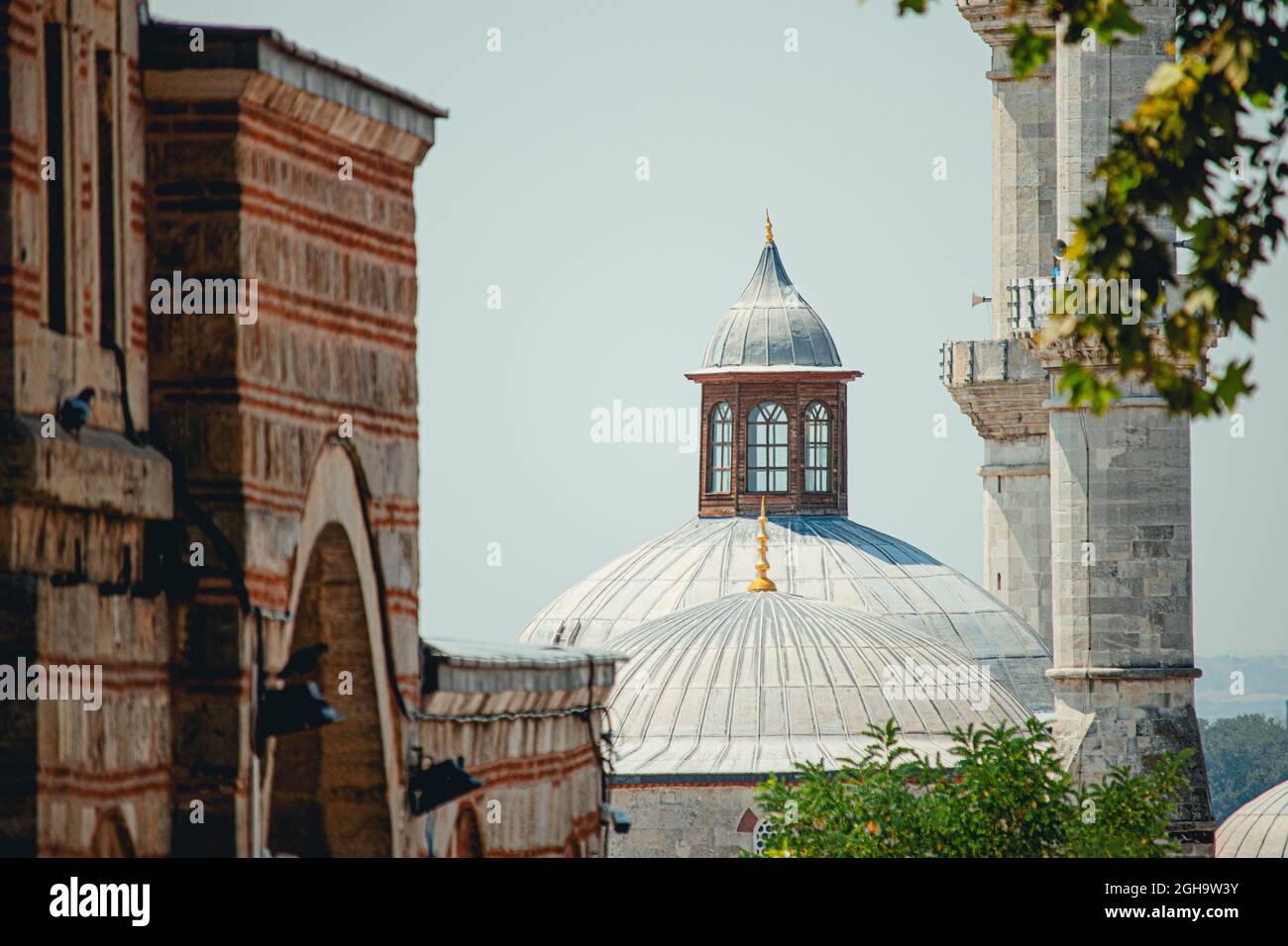 Side view of minarets and dome of Old Mosque, Edirne which is built on ...