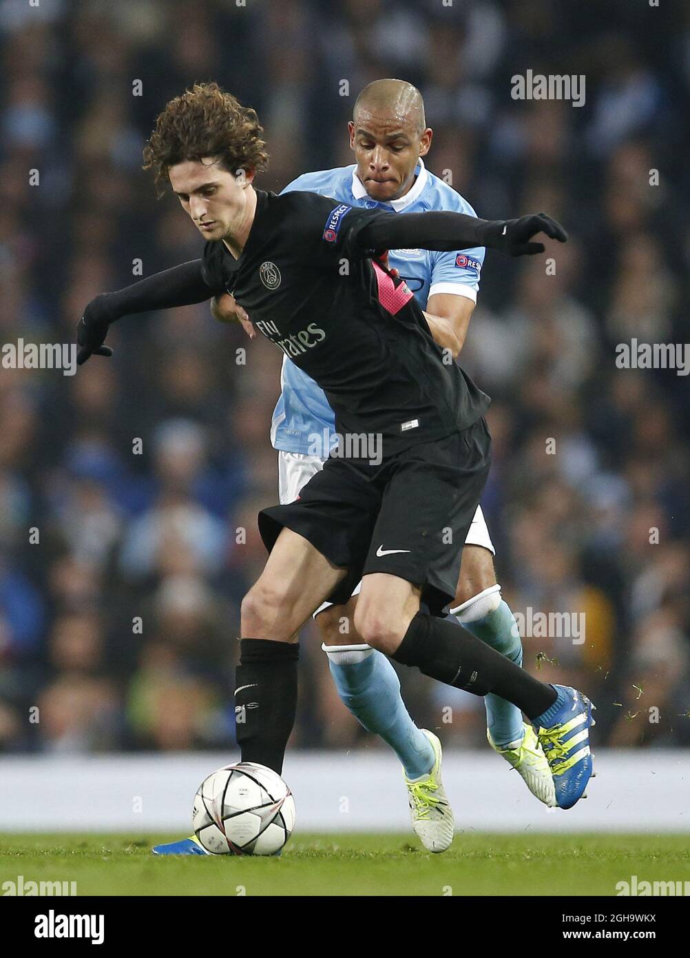 Fernando of Manchester City battles Adrien Rabiot of PSG during the ...
