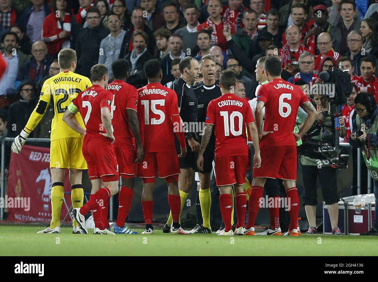Liverpool players argue with referee Jonas Ericsson during the UEFA ...