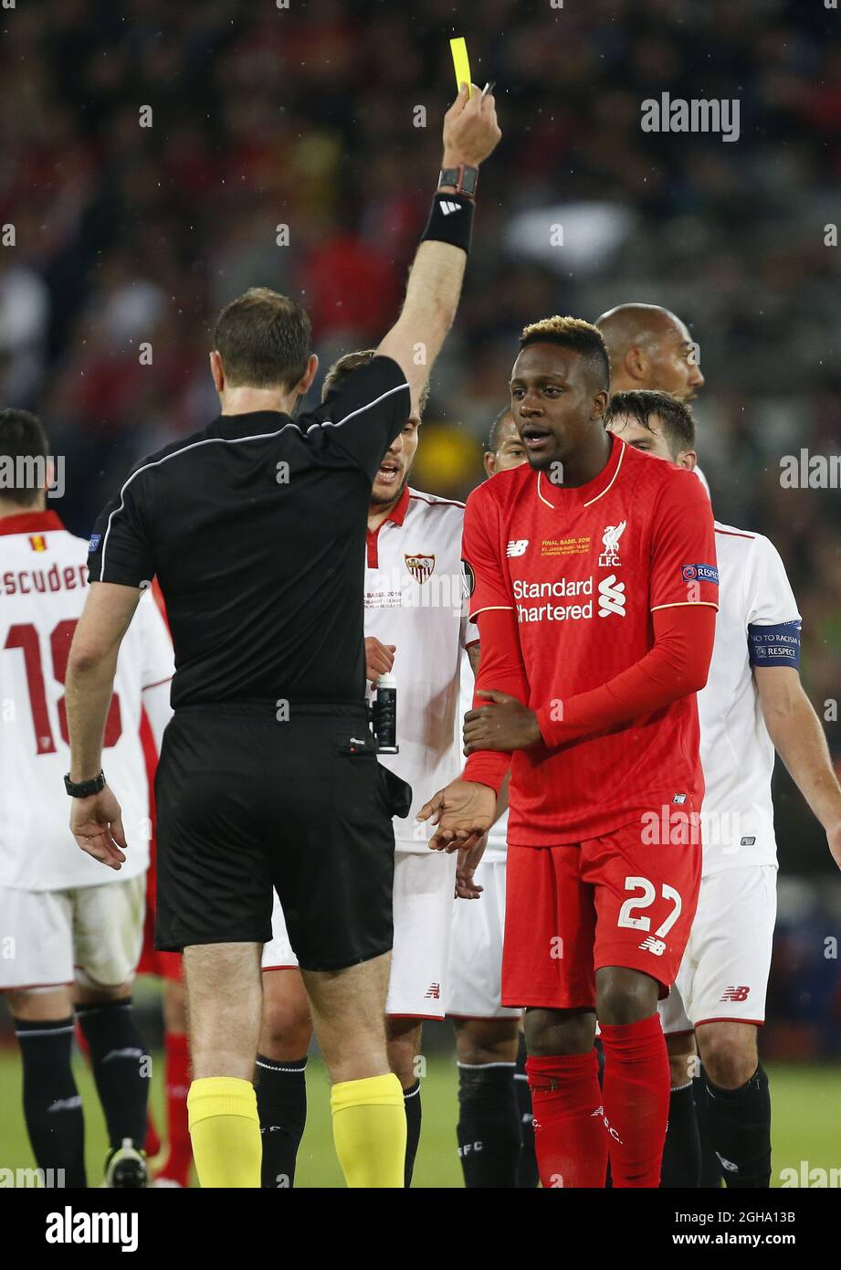 Divock Origi of Liverpool receives a yellow card during the UEFA Europa ...