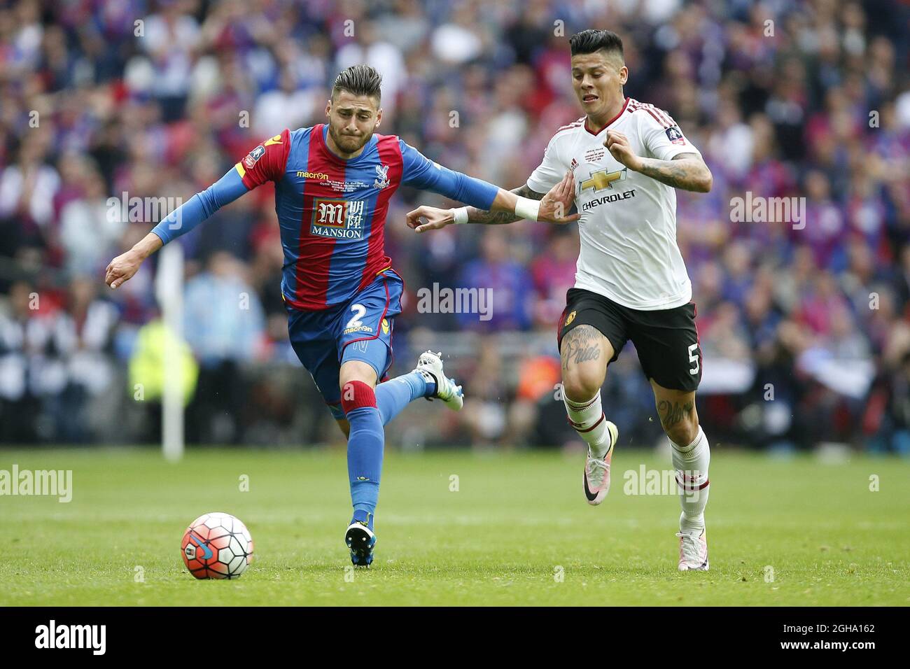 Joel Ward of Crystal Palace battles Marcos Rojo of Manchester United ...