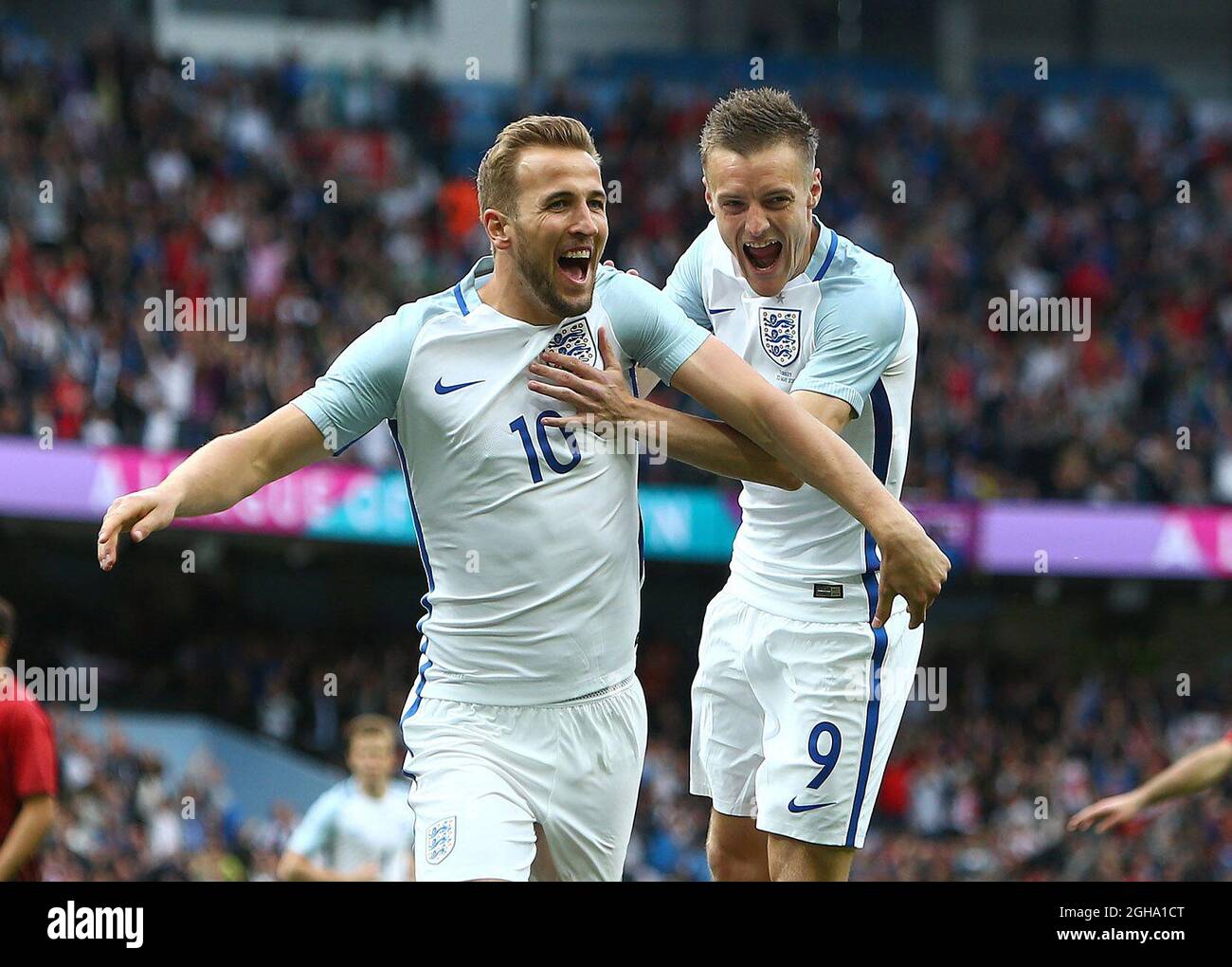 Harry Kane of England celebrates scoring the opening goal with Jamie ...