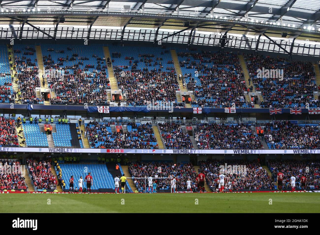 The game plays out in front of thousands of empty seats during the ...