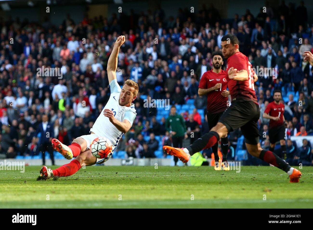 Harry Kane of England slips and sends a late chance on goal wide during ...