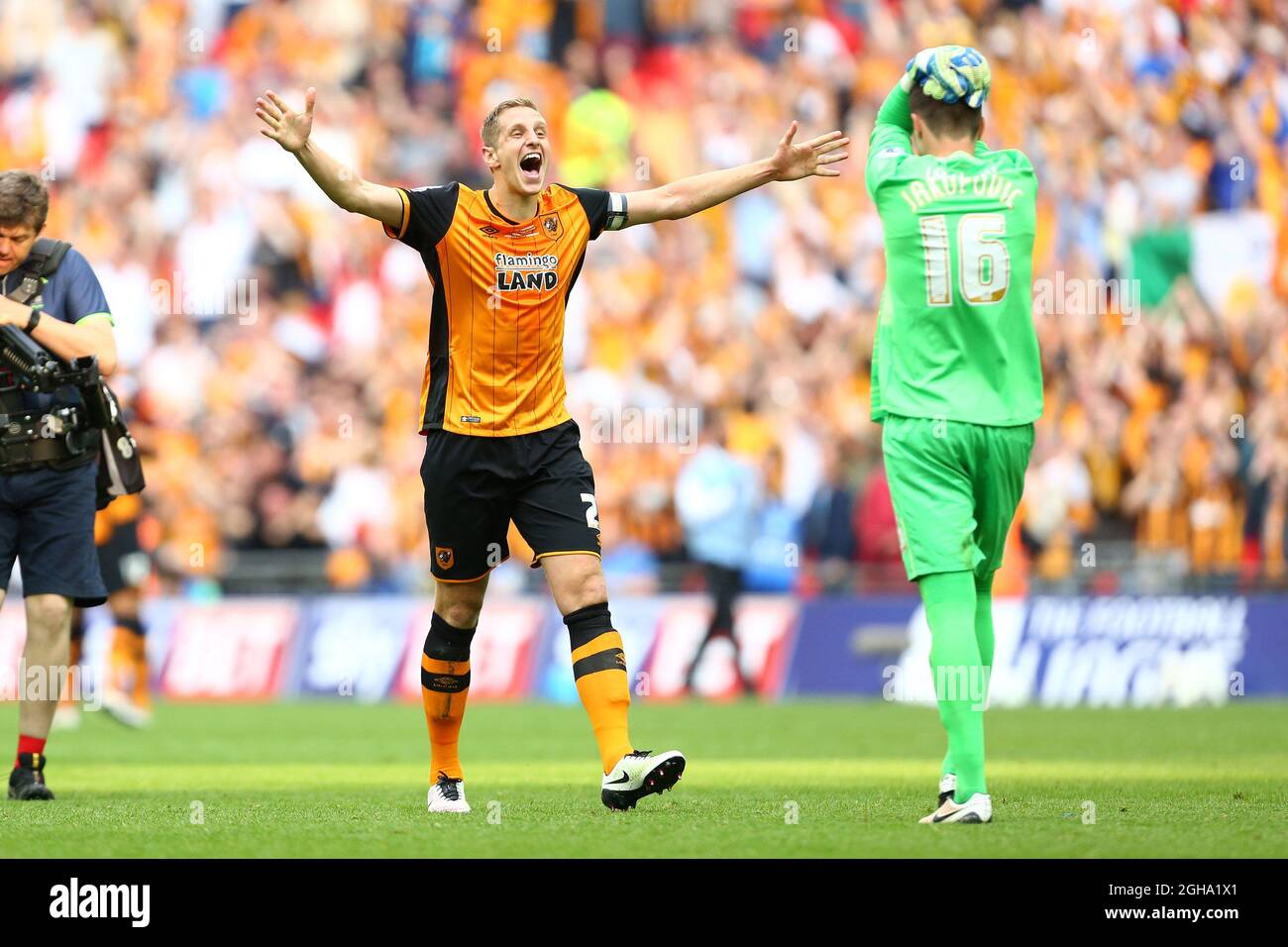 Hullâ€™s Michael Dawson celebrates promotion during the Skybet ...