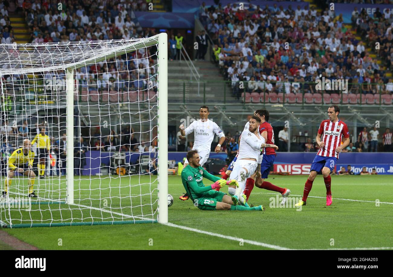 Sergio Ramos of Real Madrid scoring the first goal past Jan Oblak of ...