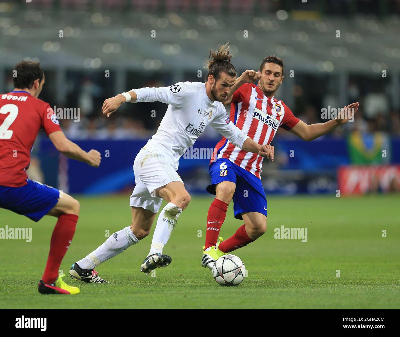 Gareth Bale of Real Madrid tackled by Koke of Atletico madrid during ...