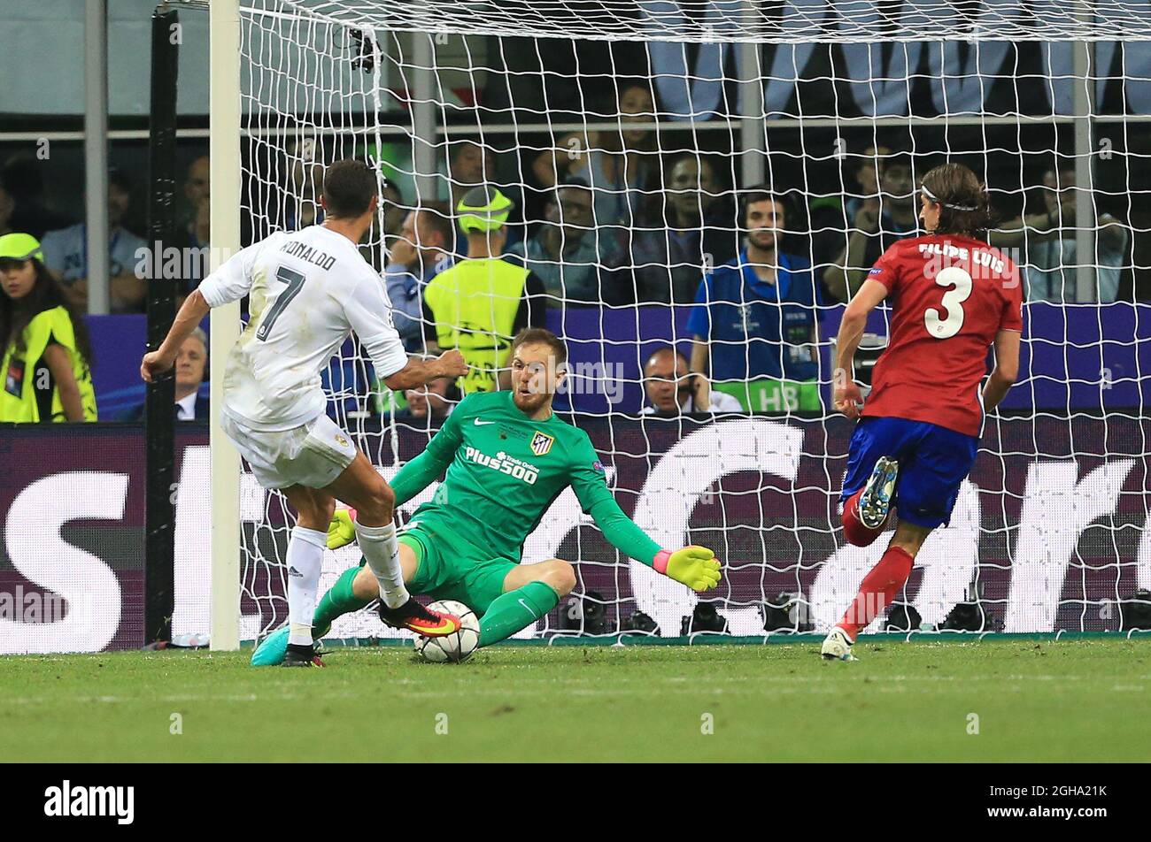 Jan Oblak of Atletico Madrid saves at the feet of Cristiano Ronaldo of ...