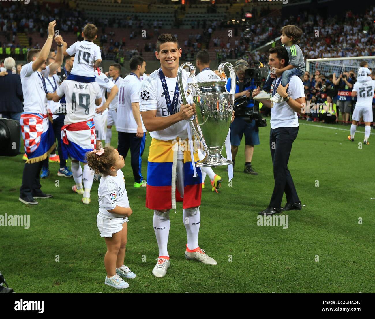 James Rodriguez of Real Madrid lifts the UEFA Champions League Trophy ...