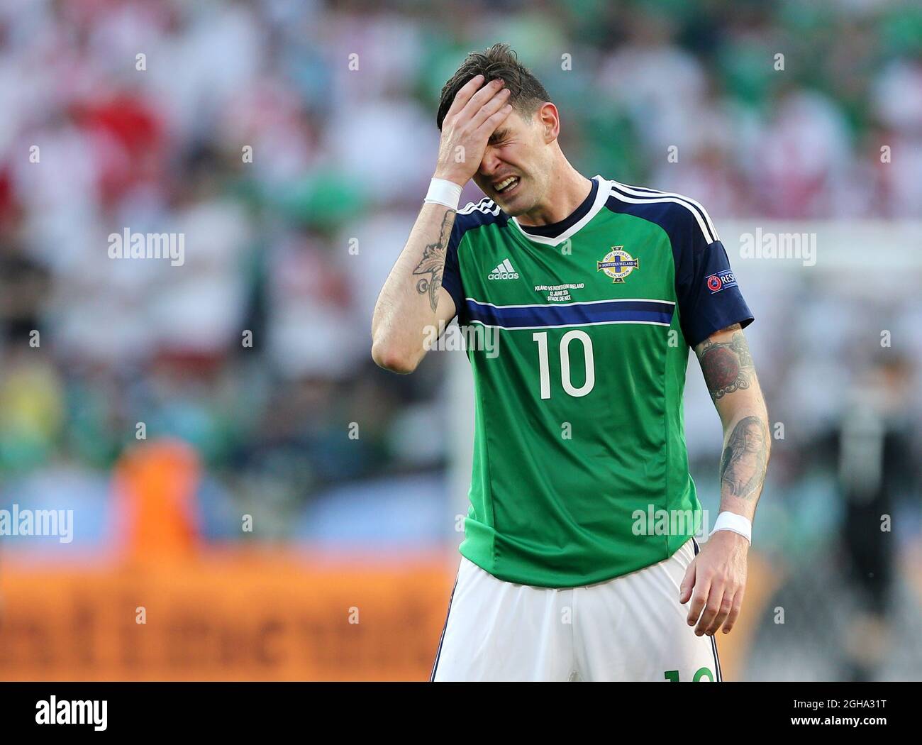 Northern Ireland's Kyle Lafferty looks on dejected during the UEFA ...