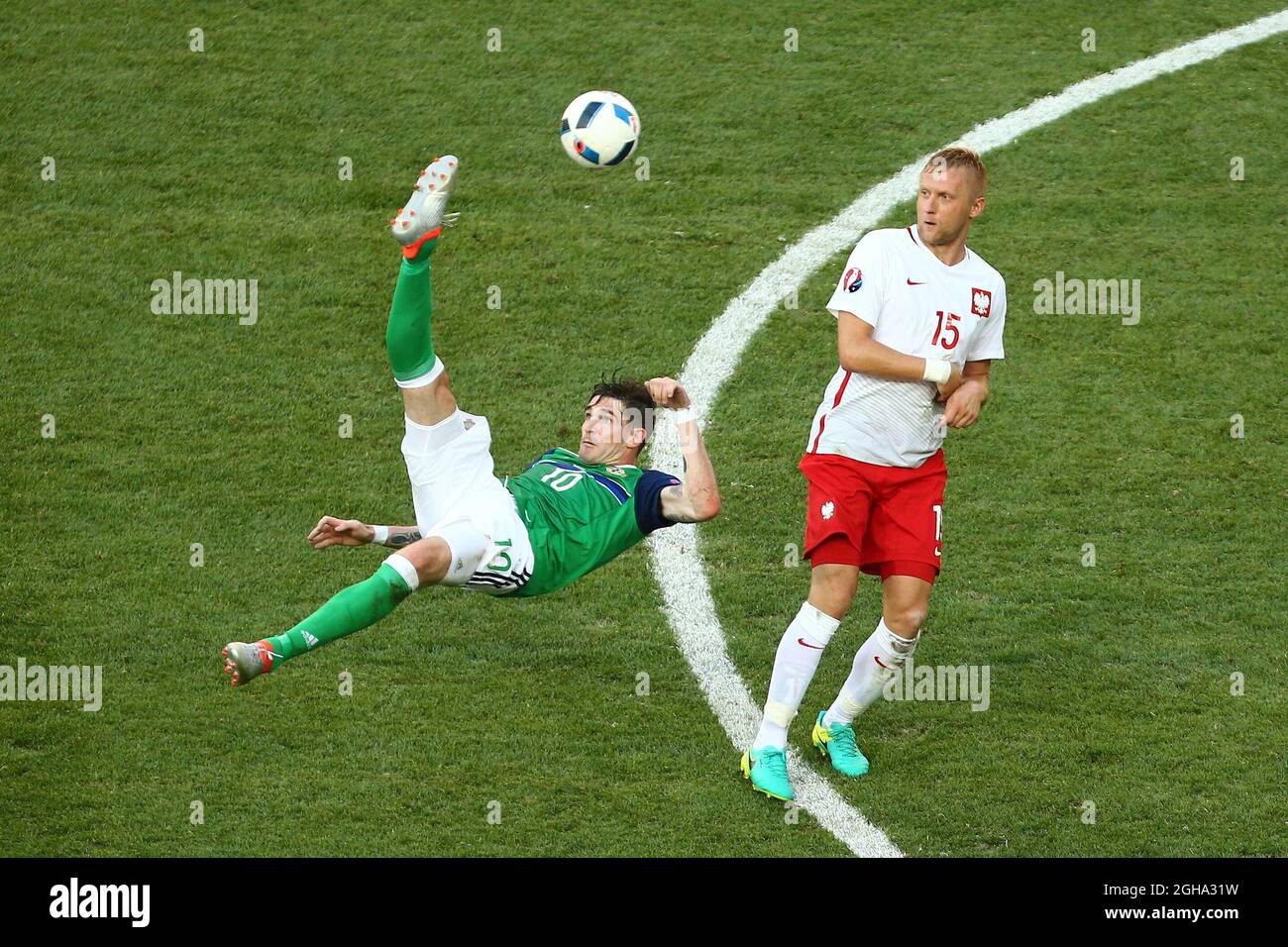 Kyle Lafferty of Northern Ireland attempts an overhead shot on goal ...