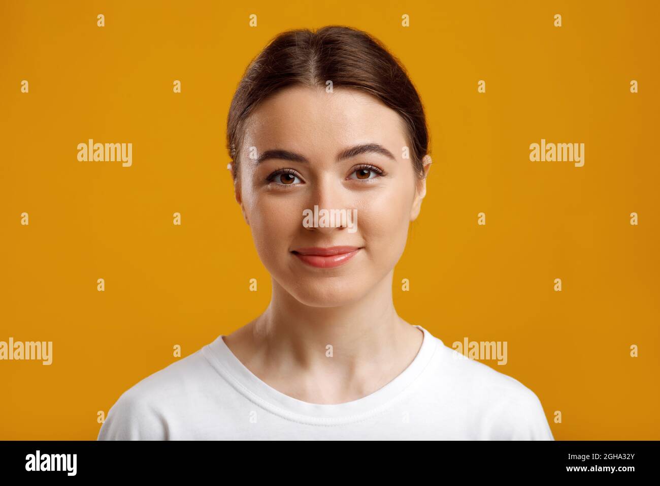 Closeup portrait of young woman with formal hairstyle Stock Photo - Alamy
