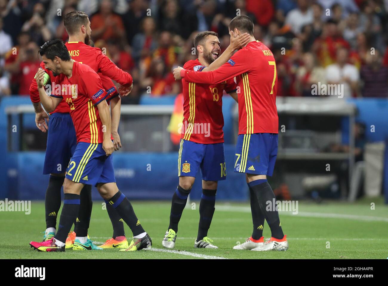 Jordi Alba congratulates Alvaro Morata of Spain on his second goal ...