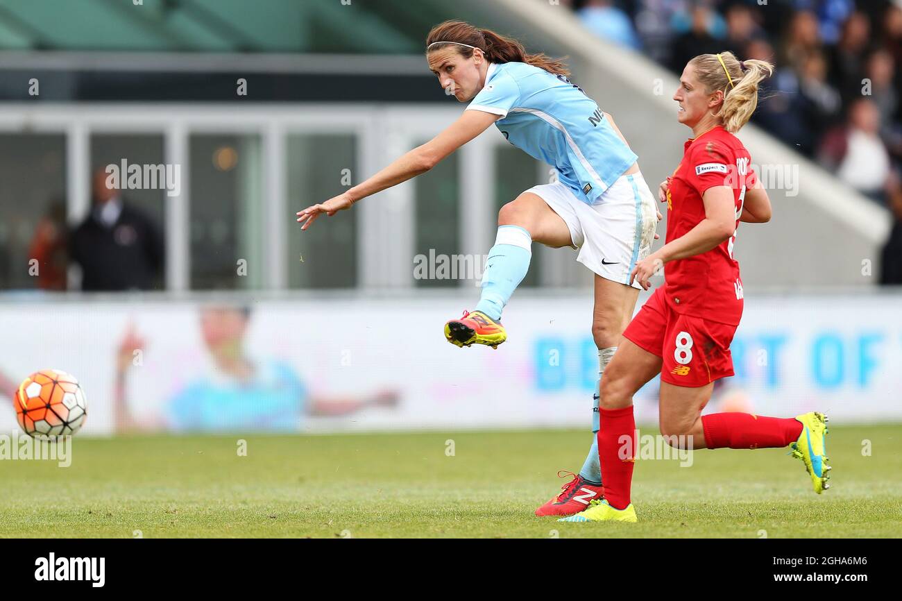 Laura Coombs of Liverpool Ladies watches Jill Scott of Manchester City ...