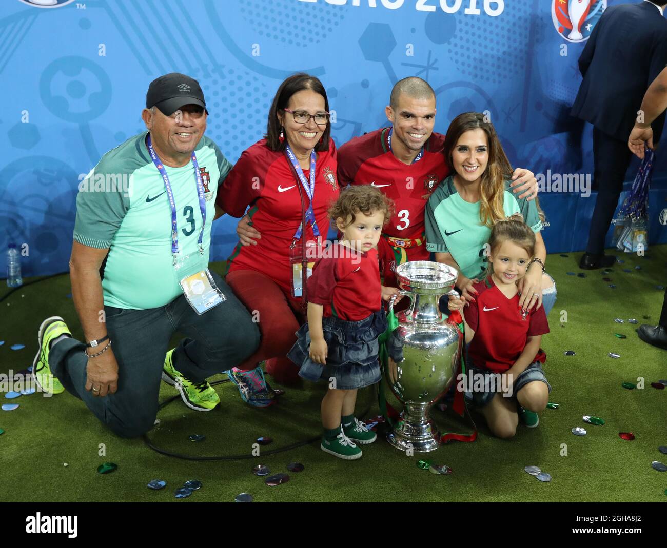 Pepe of Portugal poses with his family and the trophy during the UEFA ...