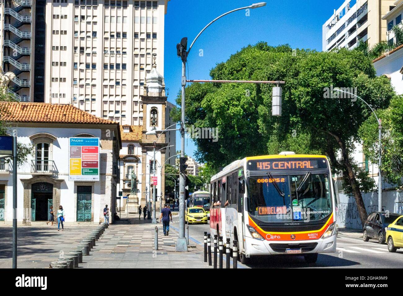 Public transportation bus driving in the city center in Rio de Janeiro ...