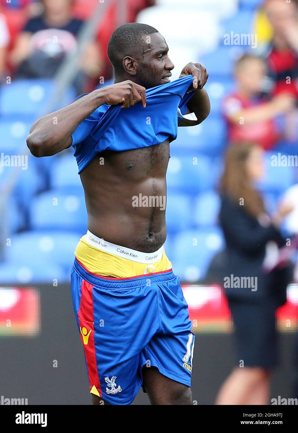 Crystal Palace's Yannick Bolasie shows off his pants as he warms up at ...
