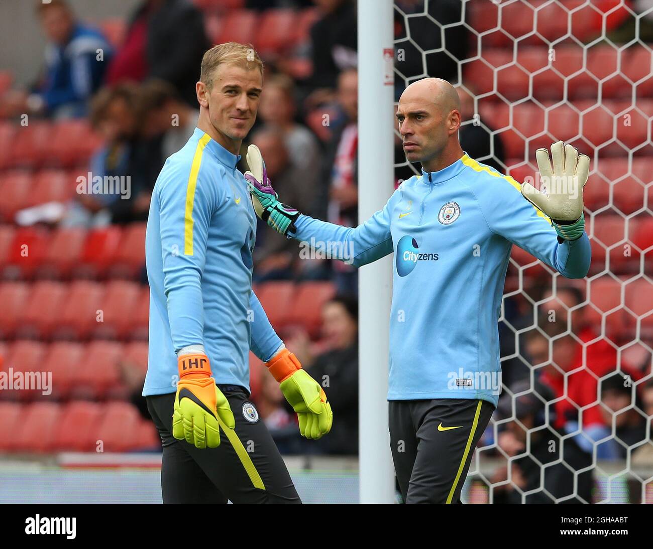 Joe Hart of Manchester City warms up with Wilfredo Caballero of ...