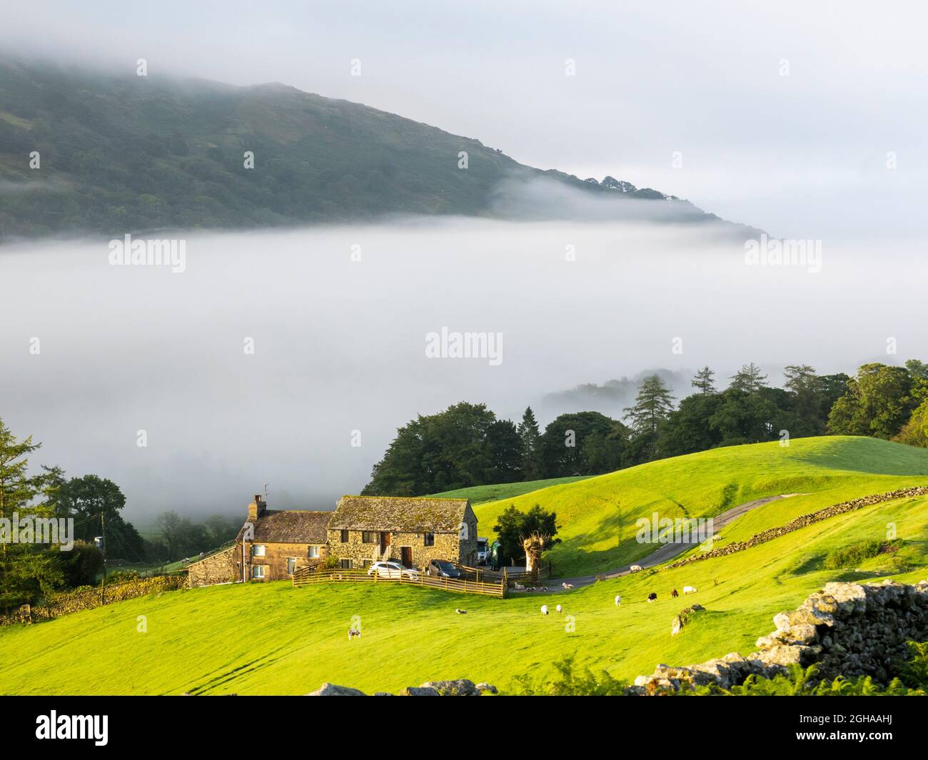 Mist over the slopes of Wansfell from Kirkstone Pass, Lake District, UK ...