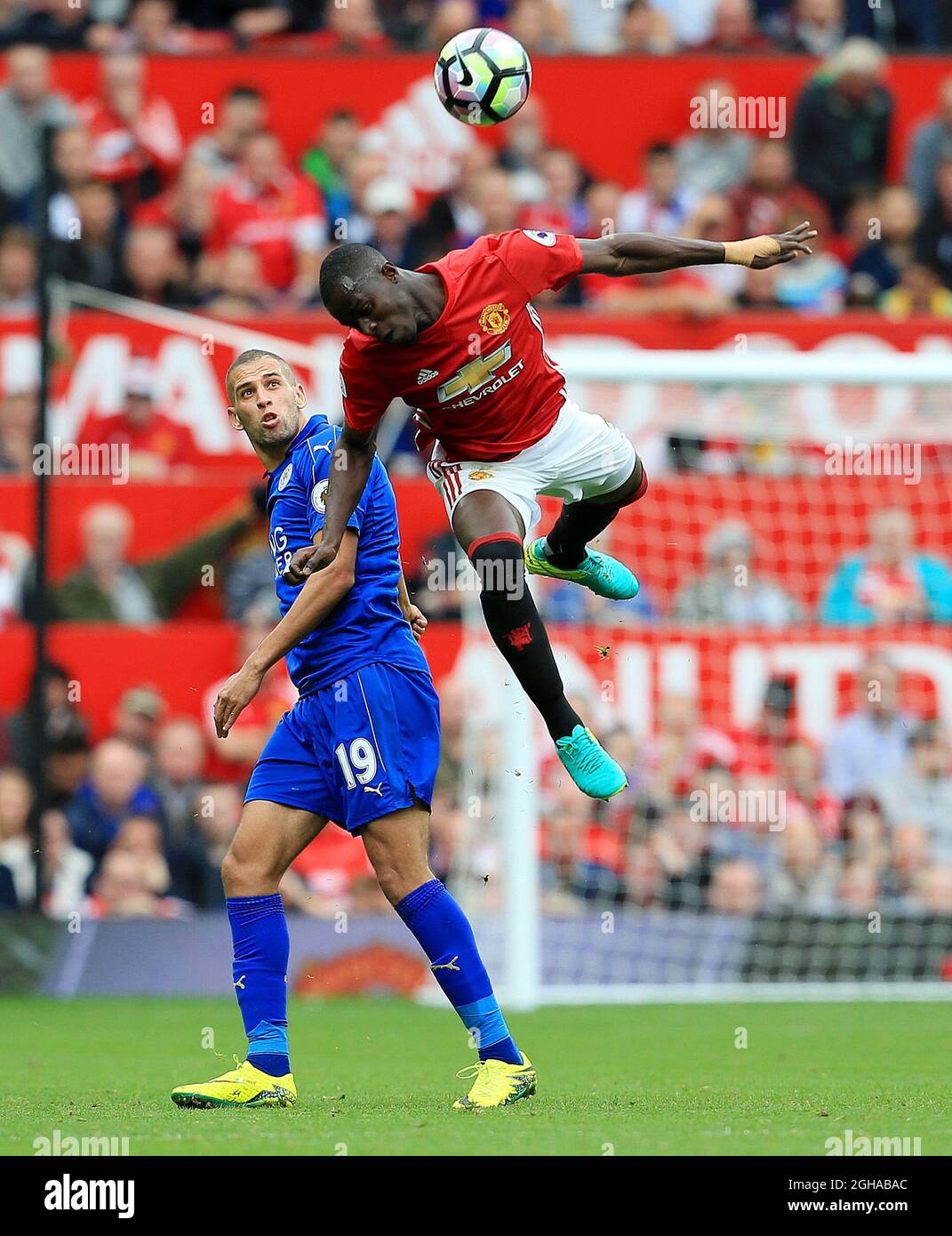 Eric Bailly of Manchester United wins a header above Islam Slimani of ...
