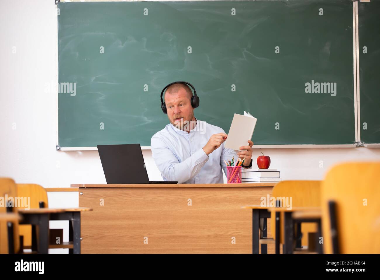 Back to School Concept. School math teacher giving virtual teaching remote class online lesson ...