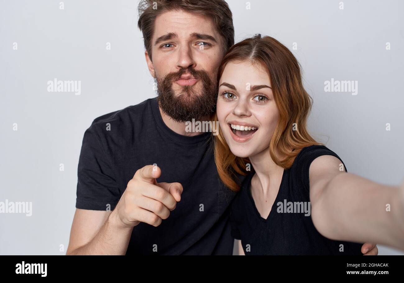 Man and woman hug communication friendship posing light background ...